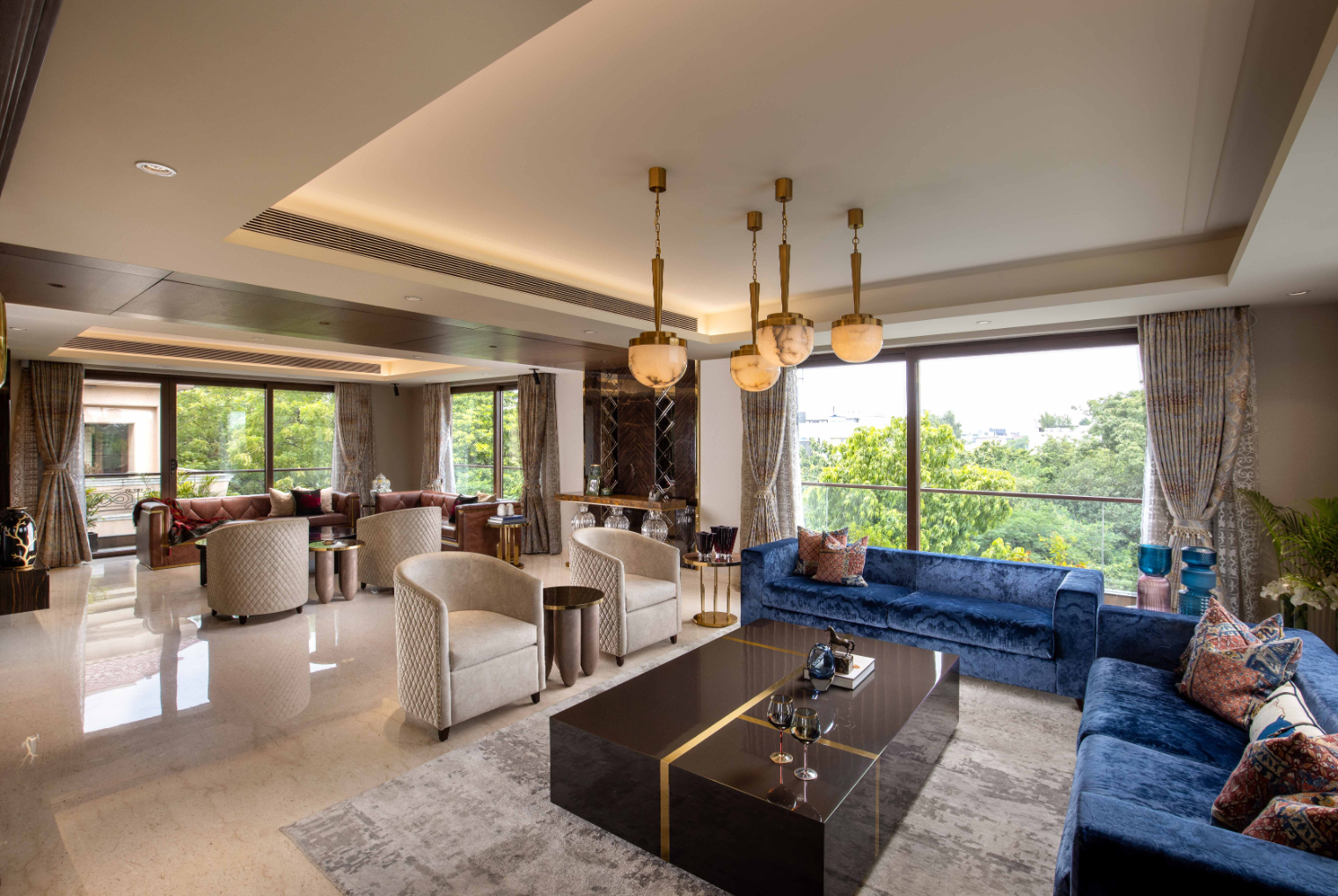 Luxury living-dining area adding a rich hue to the residence ...