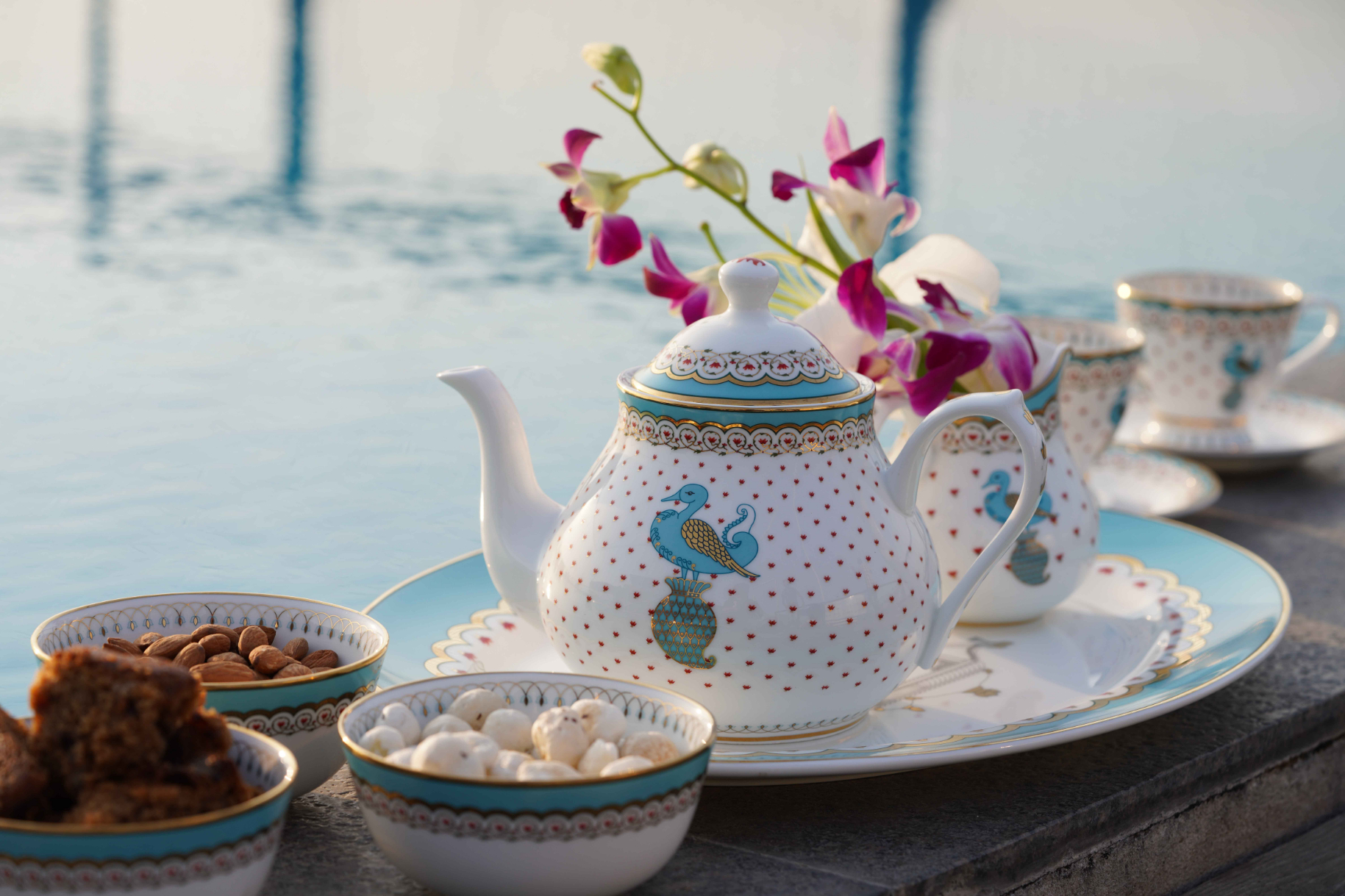 Exquisite tea time settings for a poolside afternoon tea party ...