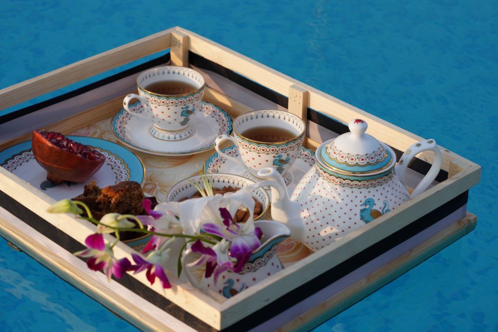 Exquisite tea time settings for a poolside afternoon tea party ...