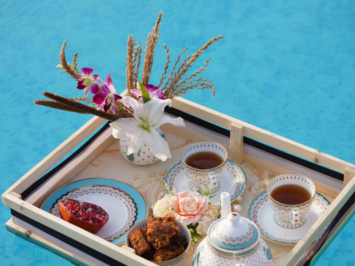 Exquisite tea time settings for a poolside afternoon tea party ...