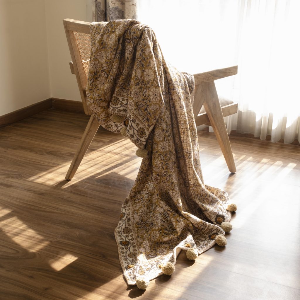 These block-printed throws will add a dash of warmth to nooks ...