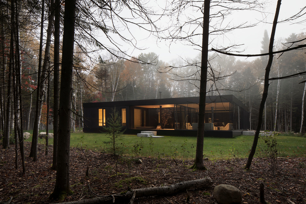 The Apple Tree House in Canada is a modernist glass residence embracing ...