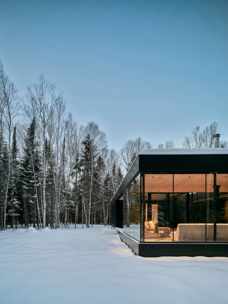 The Apple Tree House in Canada is a modernist glass residence embracing nature at its core ...