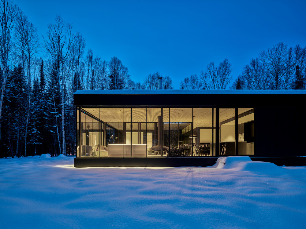 The Apple Tree House in Canada is a modernist glass residence embracing ...