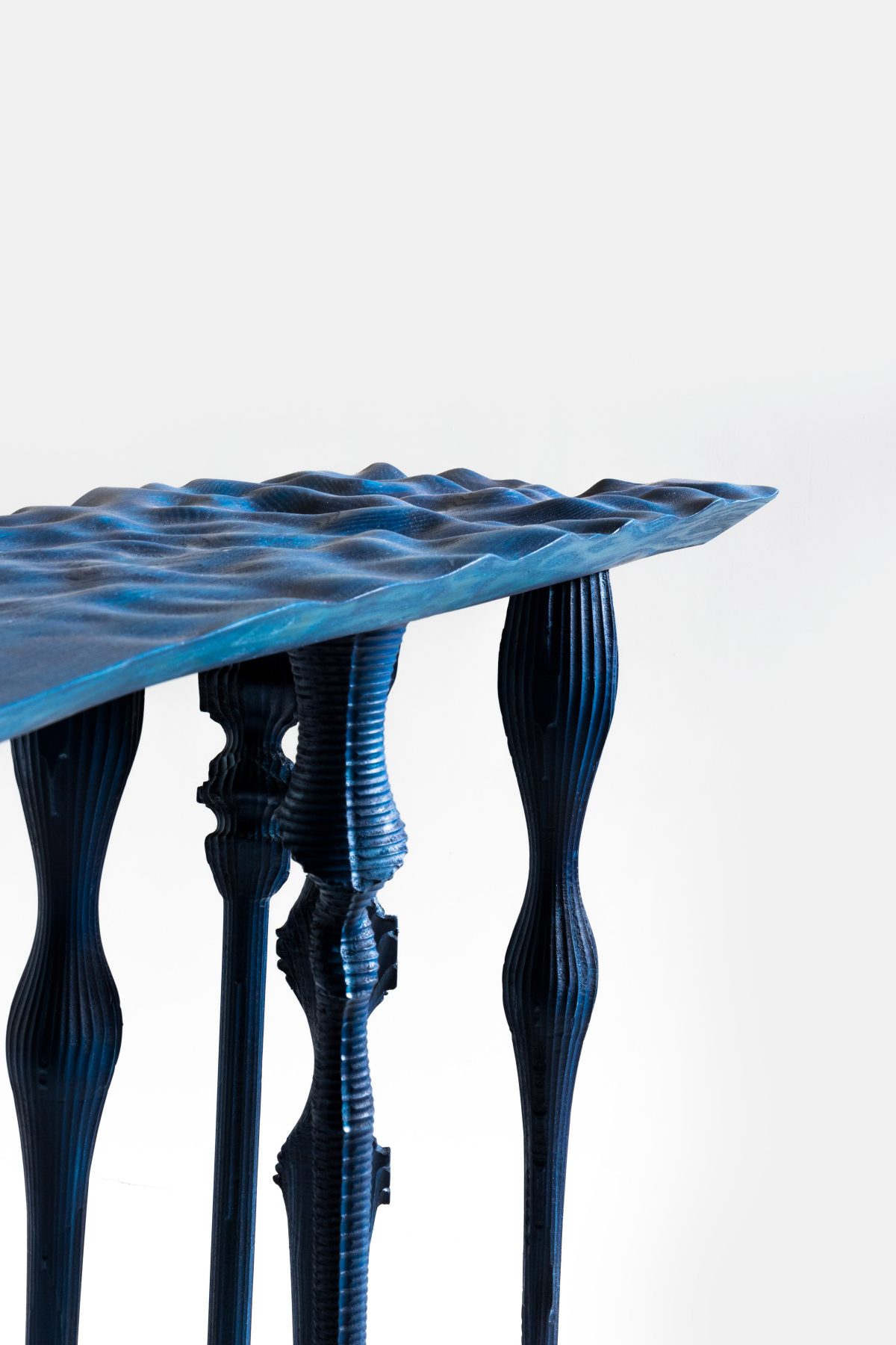Add an aesthetic highlight with this ocean-inspired table - Architect ...