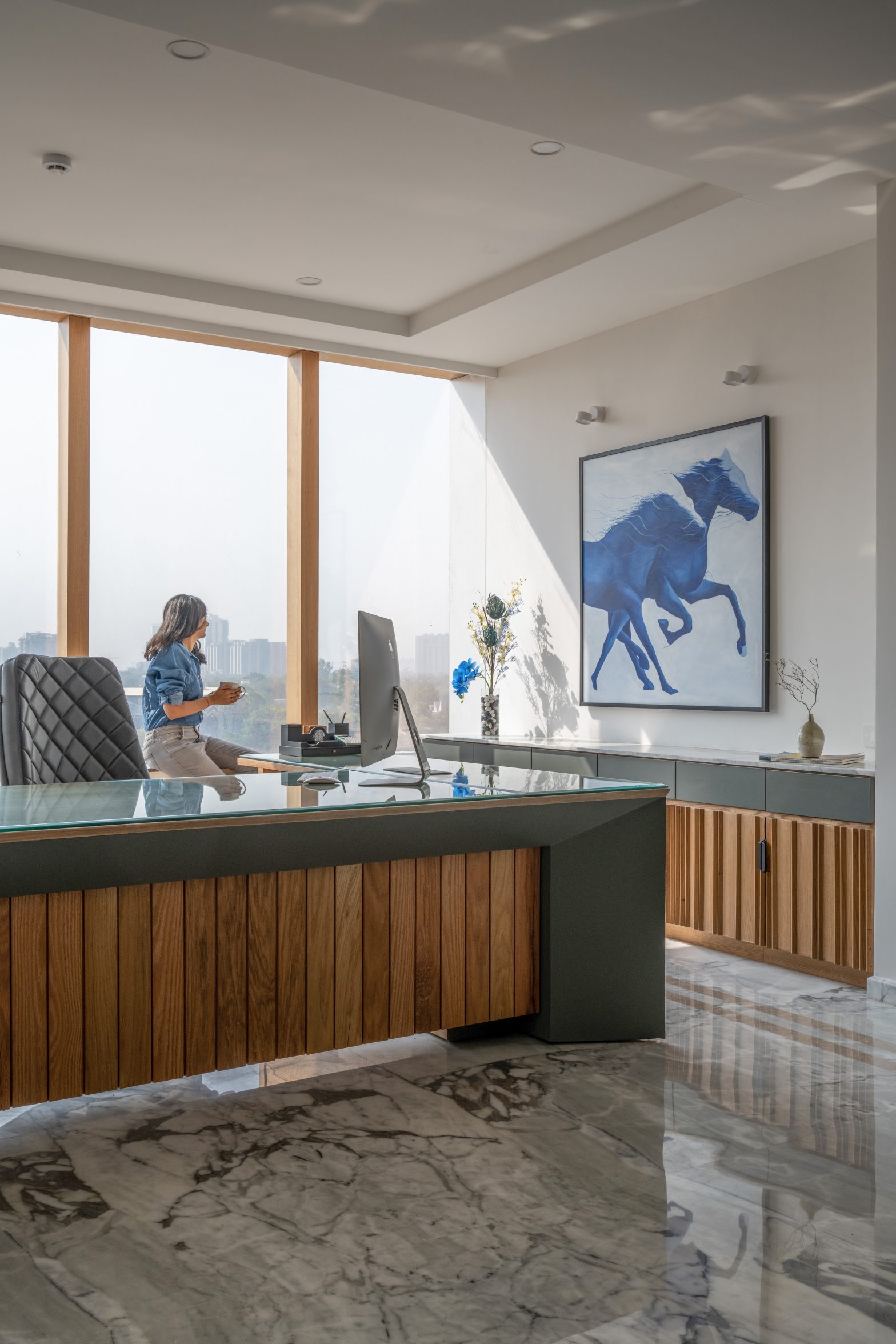 Immerse into wide Ahmedabad views that spill inside this spacious ...