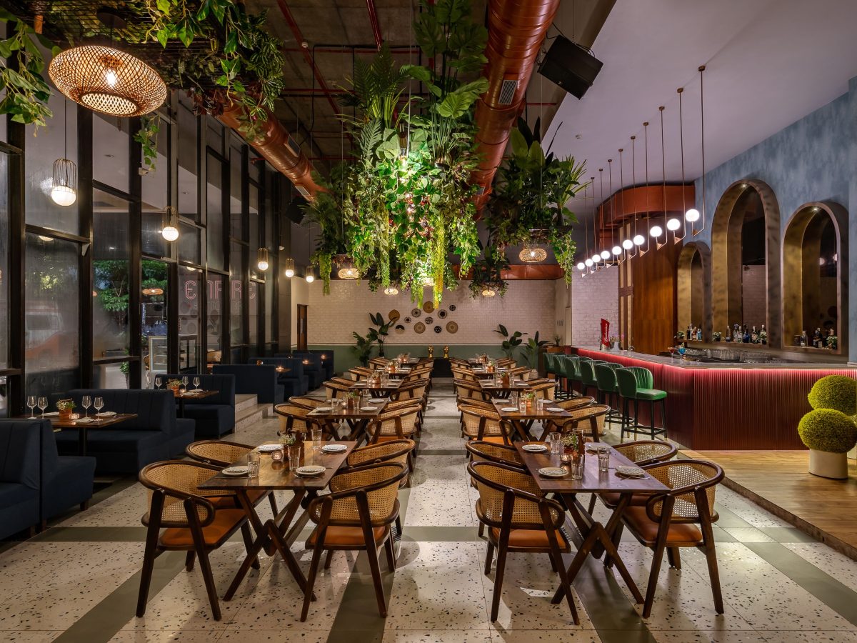 Make big biophilic statements inside Mumbai's boho bistro - Architect ...