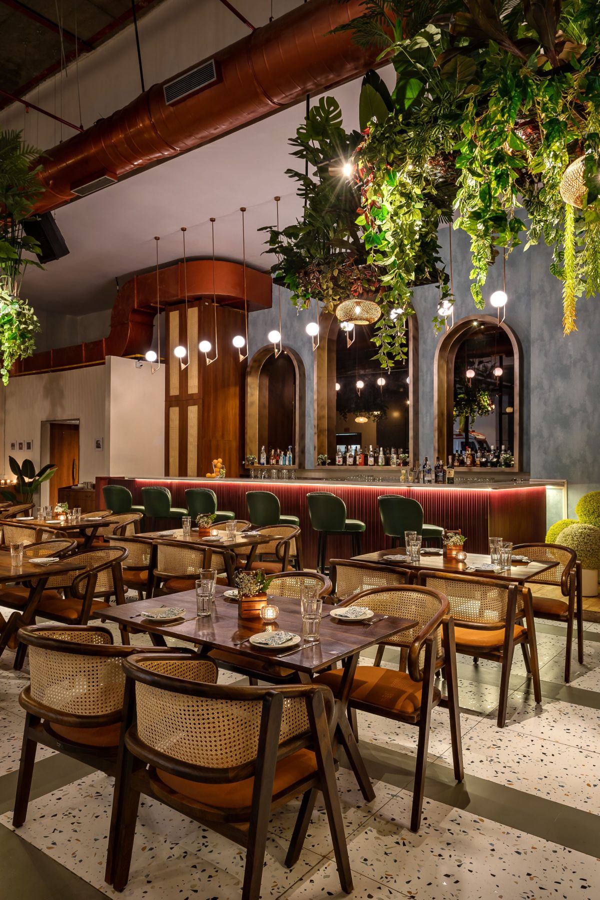 Make big biophilic statements inside Mumbai's boho bistro - Architect ...