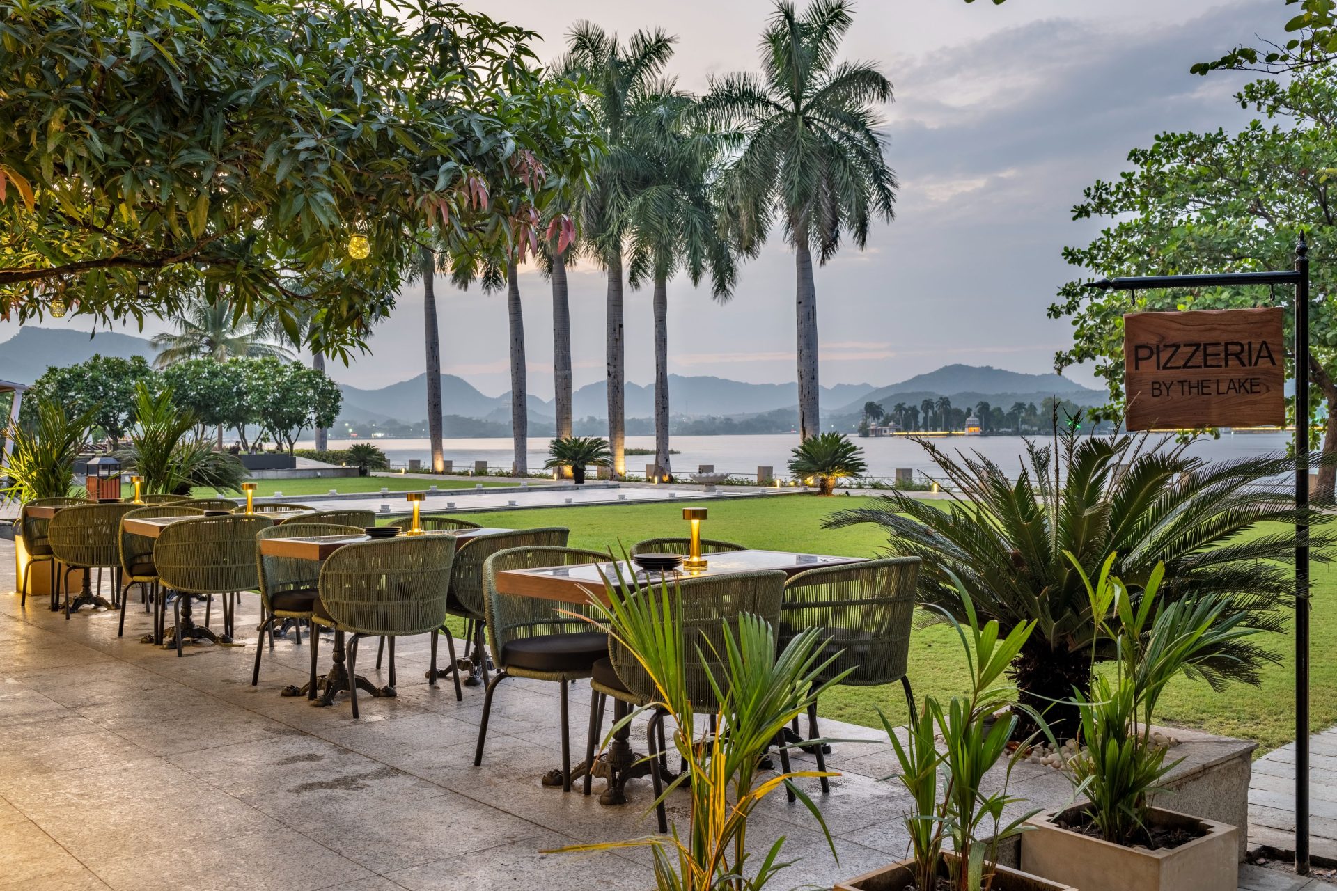 Indulge in an extraordinary culinary experience overlooking Udaipur's ...