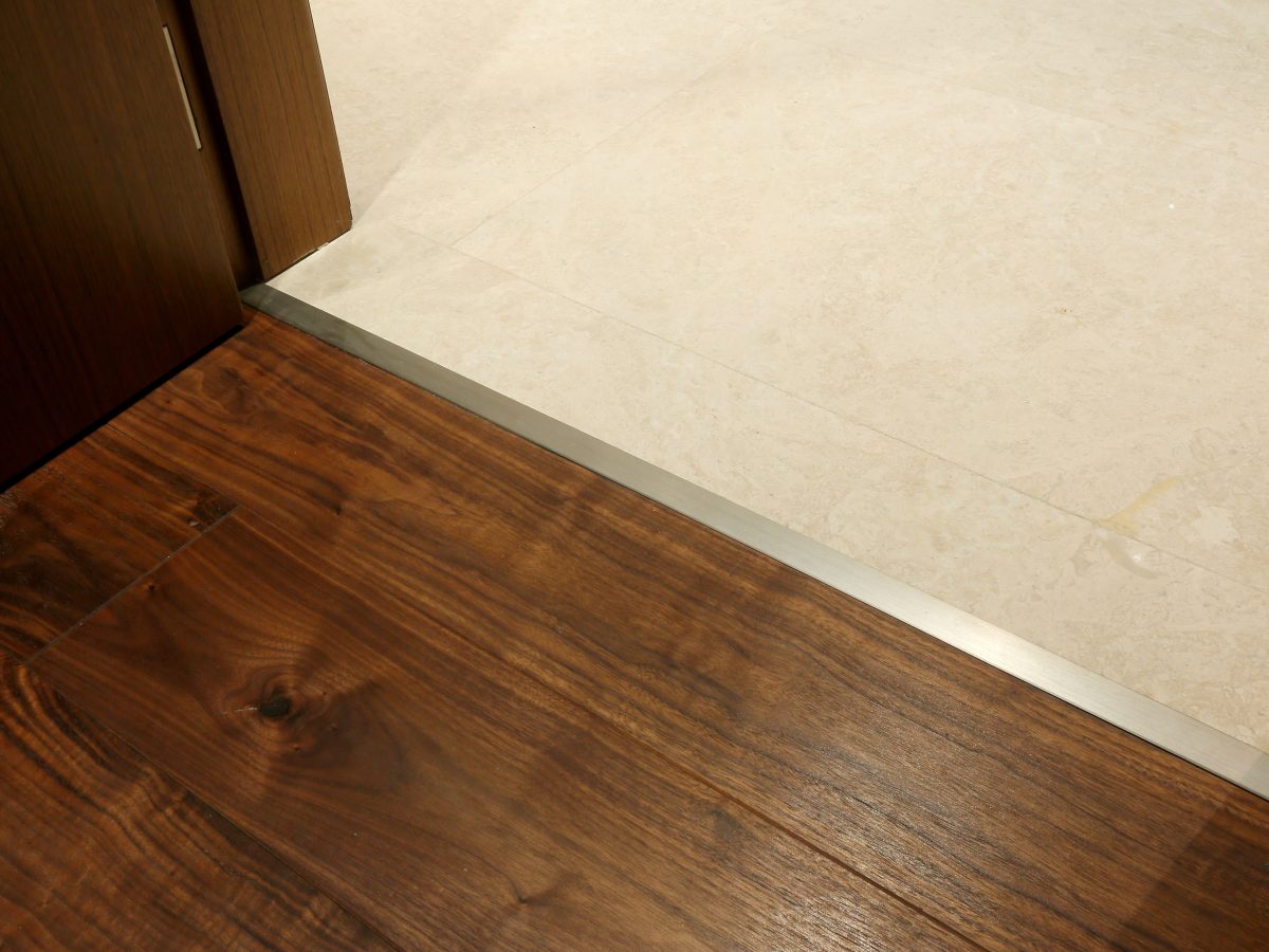 Bridge flooring transitions with these elegant profile systems ...