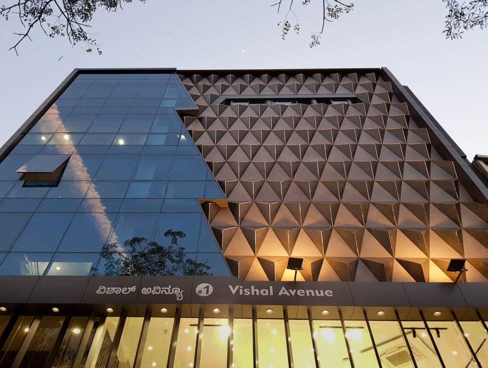 Break down the dynamic diamond-cut design of this retail avenue in ...