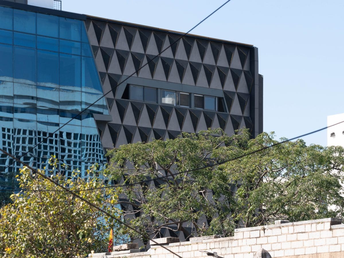 Break down the dynamic diamond-cut design of this retail avenue in ...