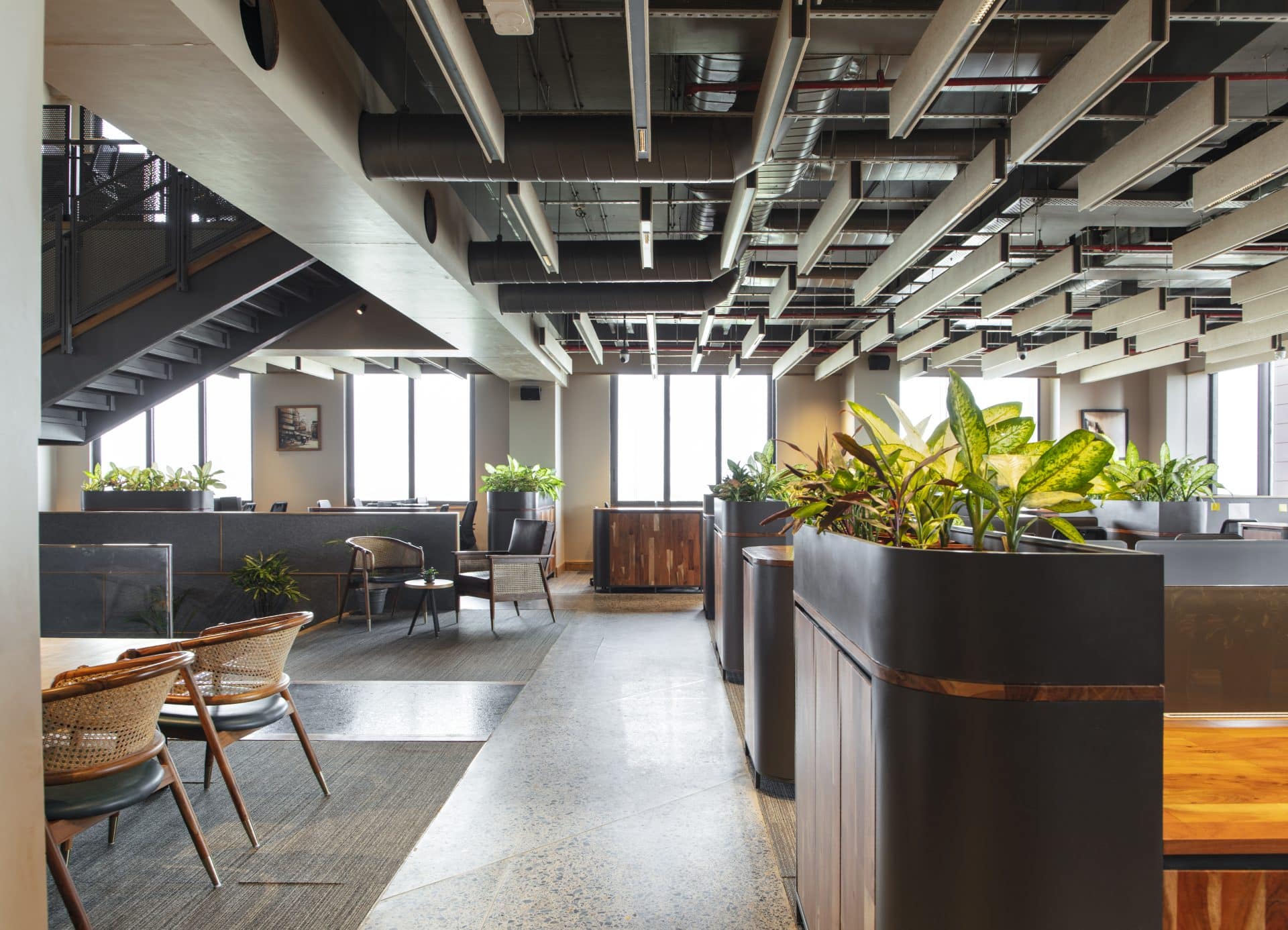 Ease into the adaptable layout of this 4-level office in Kolkata by ...