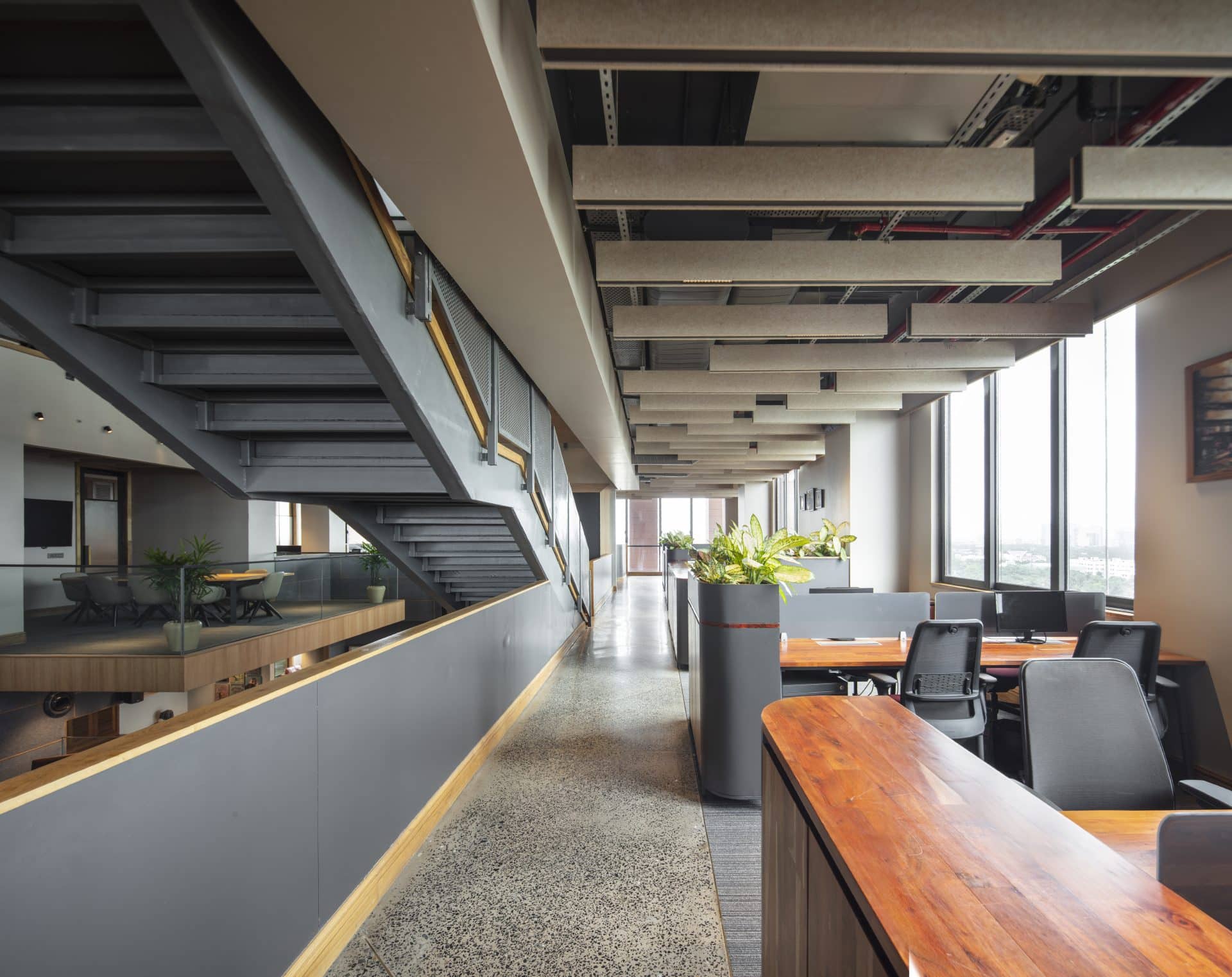 Ease into the adaptable layout of this 4-level office in Kolkata by ...
