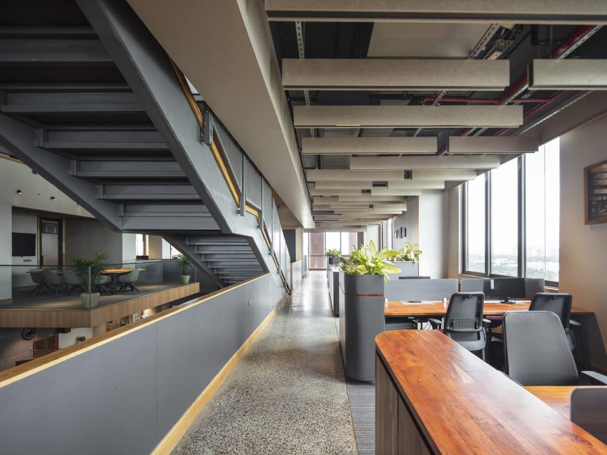 Ease into the adaptable layout of this 4-level office in Kolkata by ...