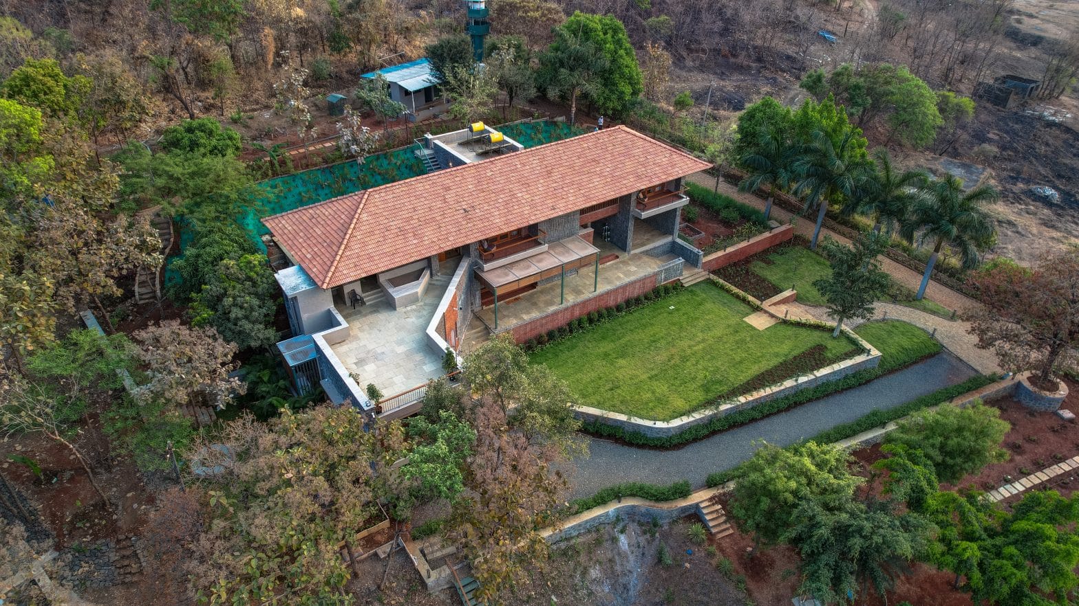 Retreat into the Pune orchards from this humble castle on the hill ...
