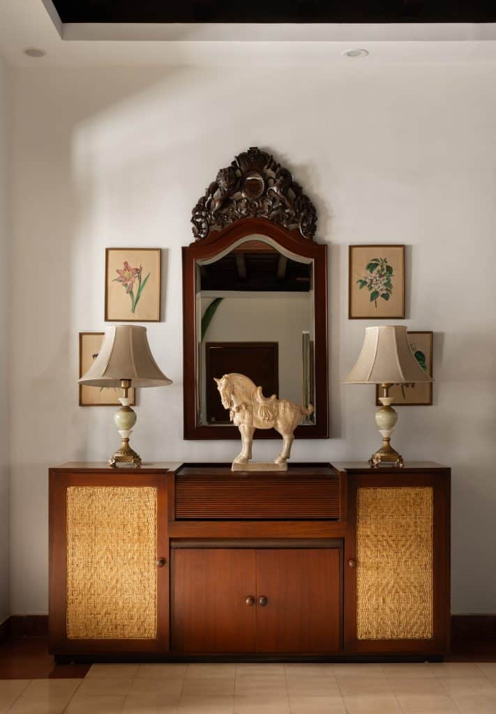Embrace India's rich heritage with this exquisite collection of teak and cane consoles and ...