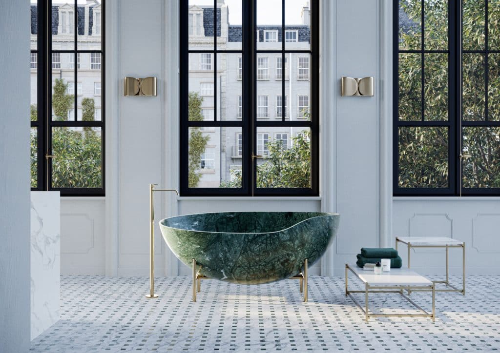 Strike a sculptural pose in the bath space with this fluid bathtub ...