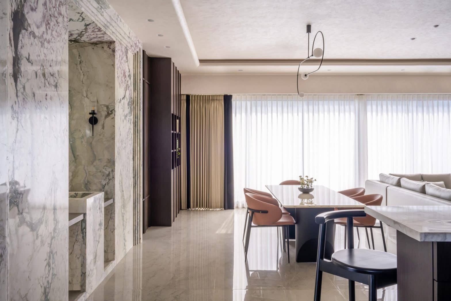 Tiptoe around the quiet luxury that tranquilizes this 1,400 sq ft Surat ...