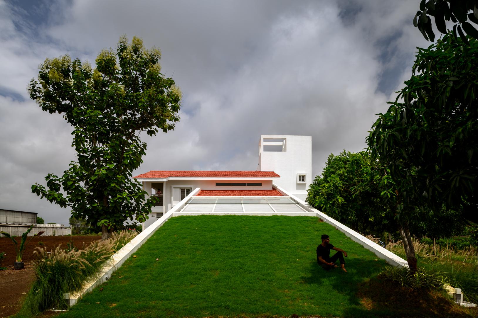 Take a closer look at the fusion of this iconic home with the lush ...